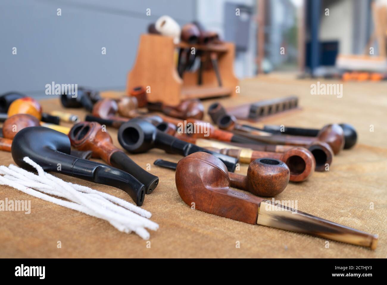 Old, retro en new Pipes in different sizes and types displayed on a ...