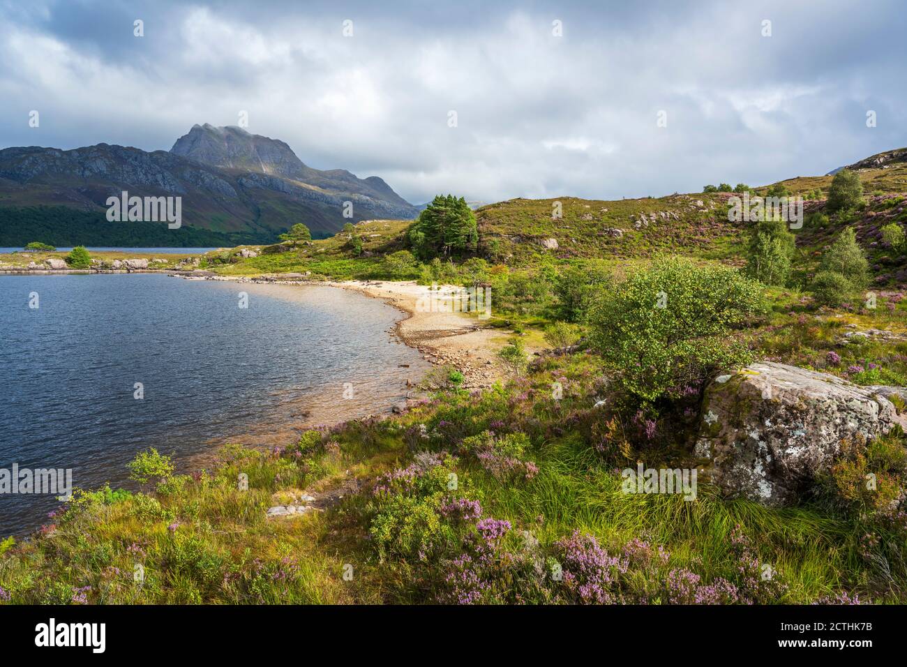 Sandy beach on Loch Maree with rugged crag of Slioch in distance – Loch ...