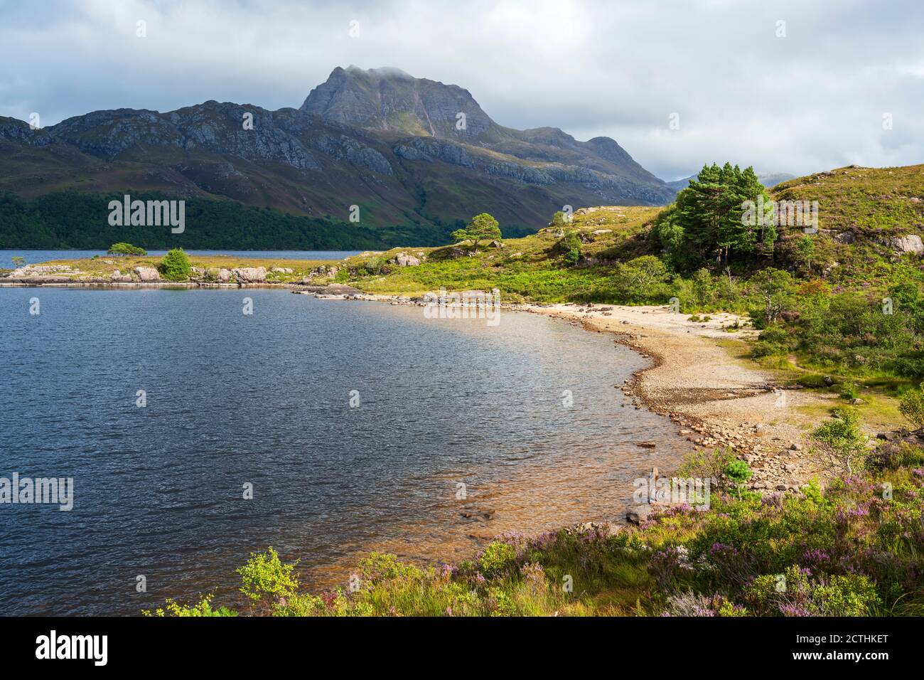 Sandy beach on Loch Maree with rugged crag of Slioch in distance – Loch ...