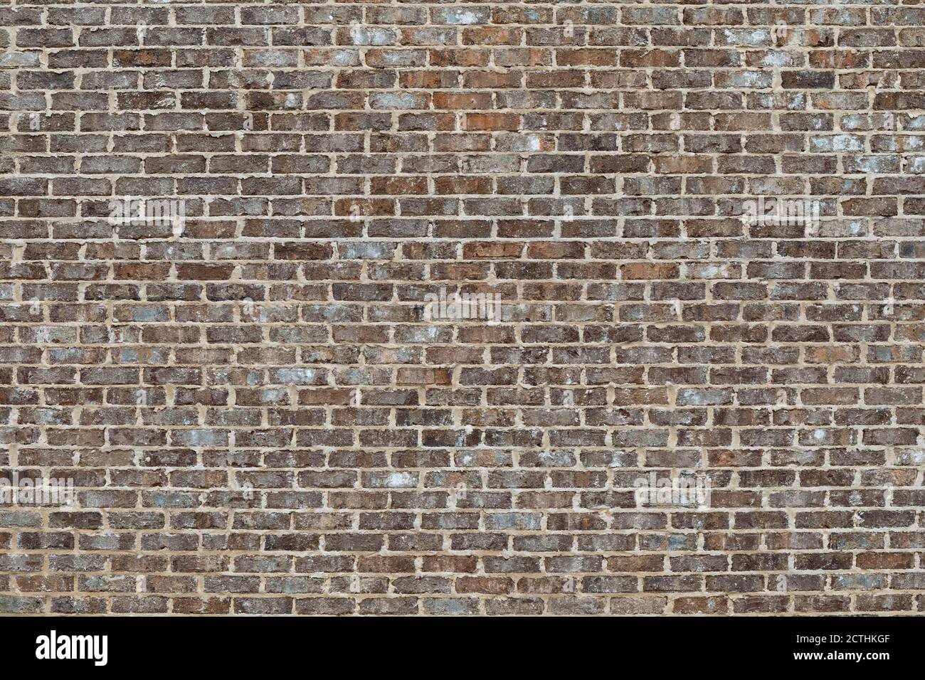 Weathered brick wall with mortar and concrete on the face, horizontal ...