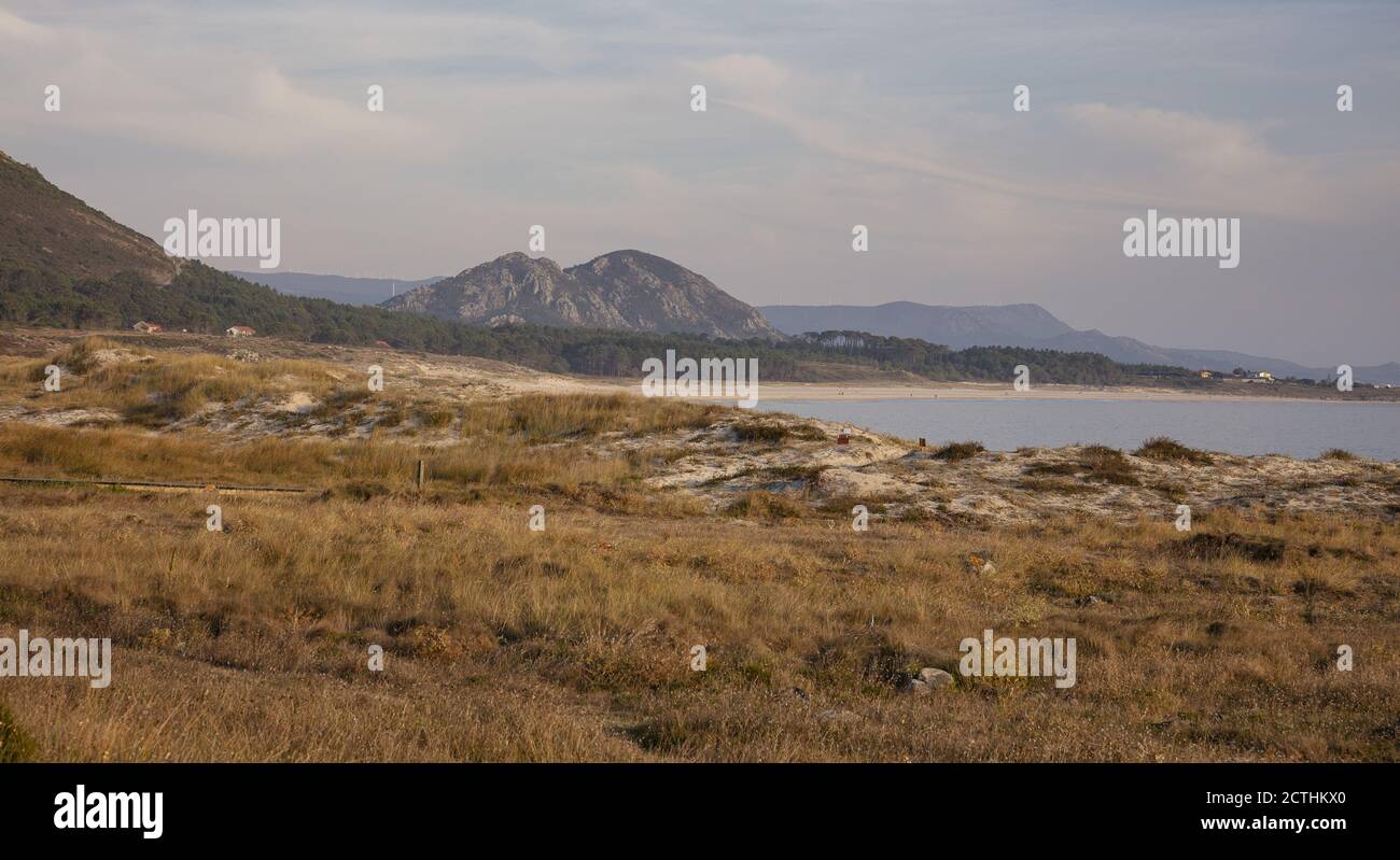 Wide shot of the Area Longa Beach with Louro Peak on the background in ...