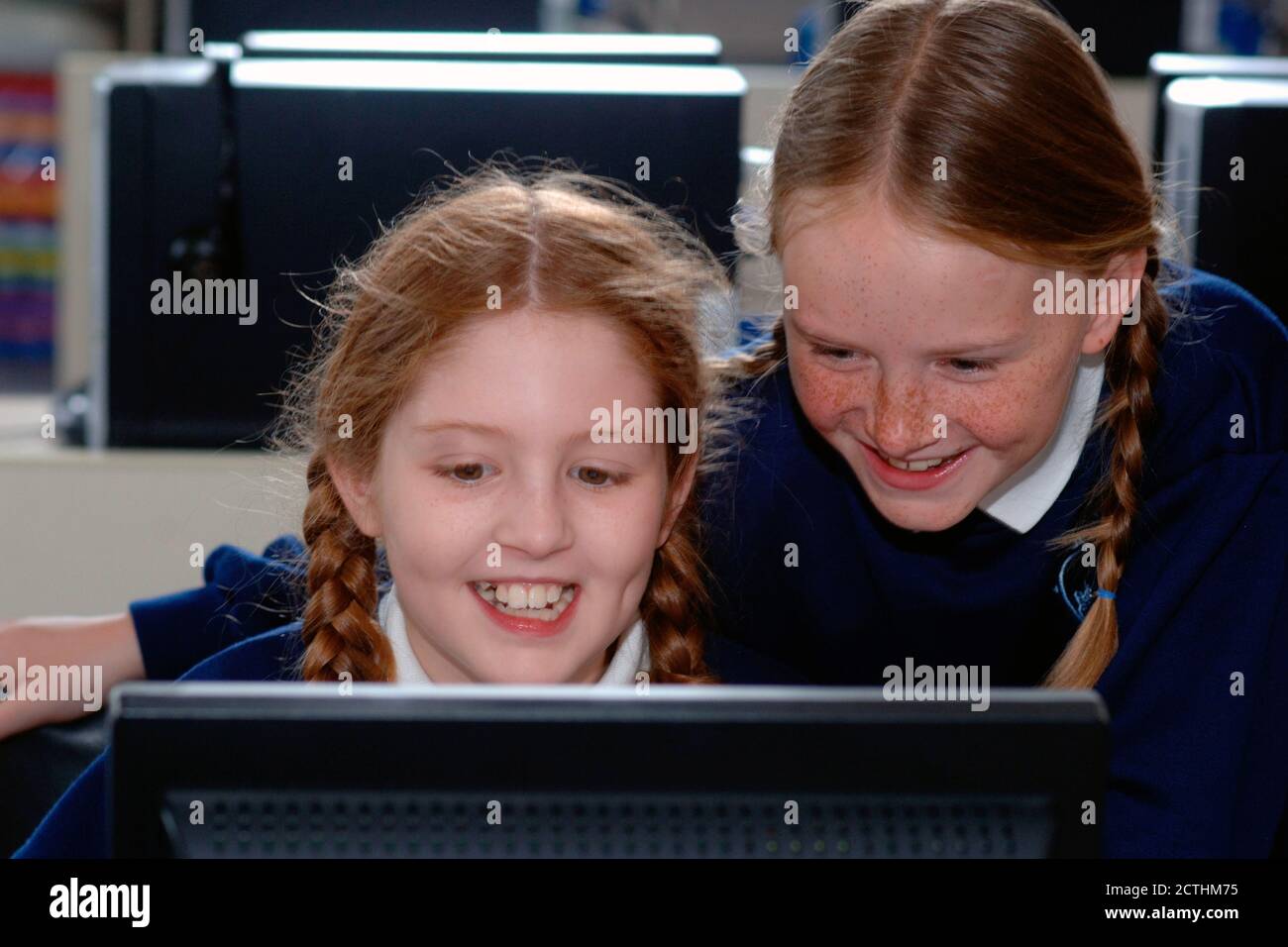 Primary schoolchildren using computers; Yorkshire UK Stock Photo - Alamy
