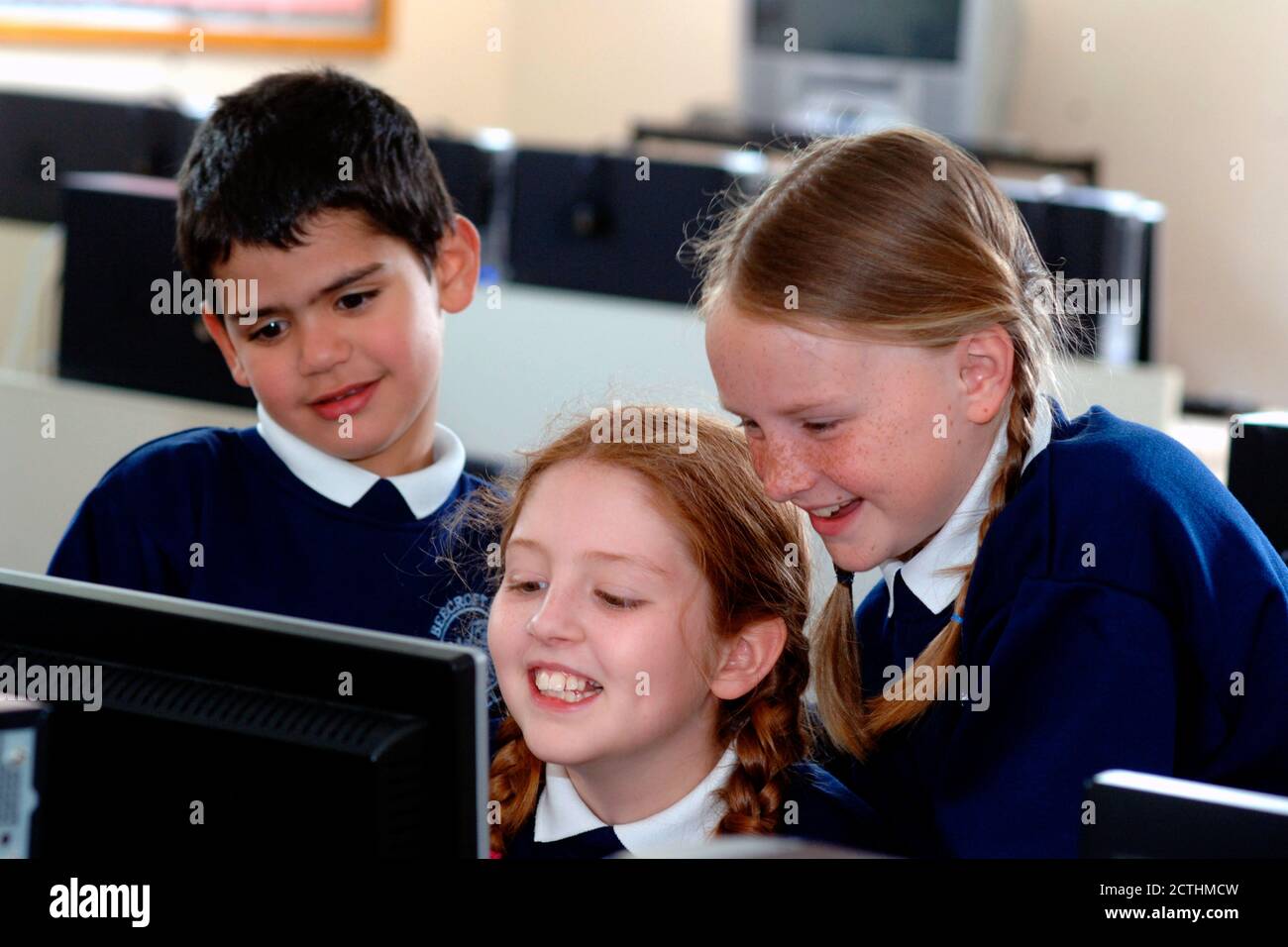 Primary schoolchildren using computers; Yorkshire UK Stock Photo - Alamy