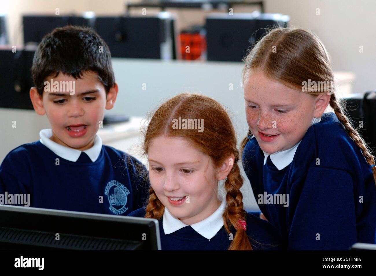 Primary schoolchildren using computers; Yorkshire UK Stock Photo - Alamy