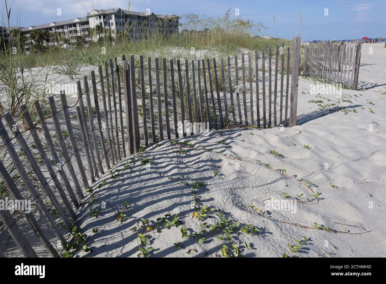View of a wooden fence on the sandy shore Stock Photo - Alamy