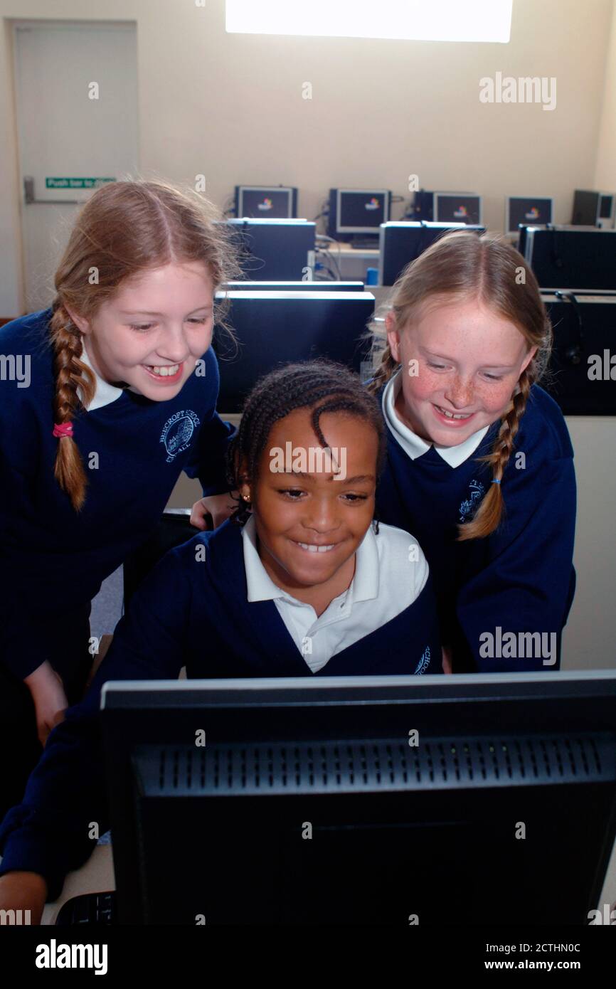 Primary schoolchildren using computers; Yorkshire UK Stock Photo - Alamy