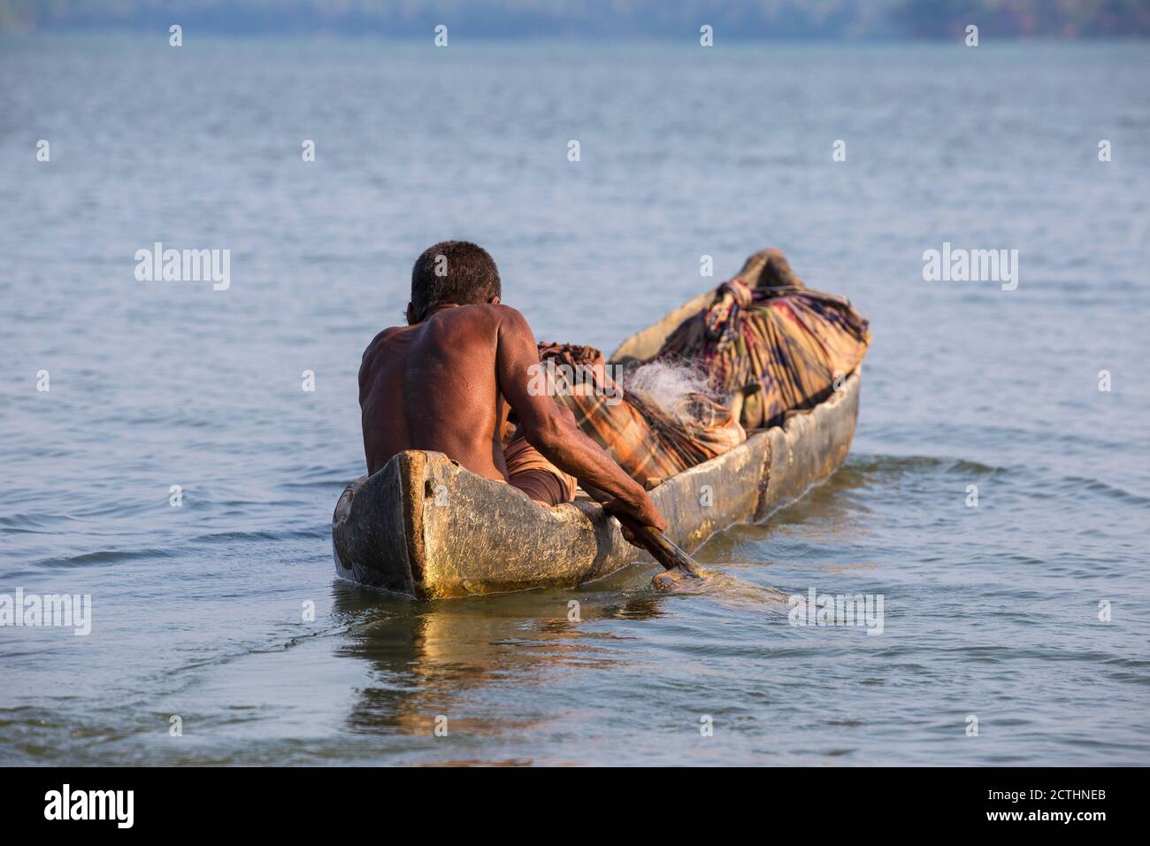 Indian fisherman in dug out canoes hi-res stock photography and images ...