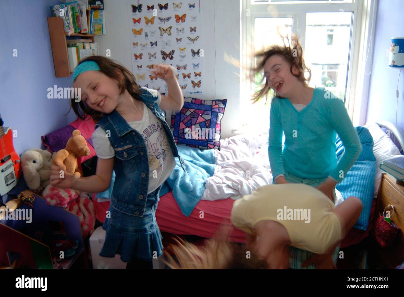young girls messing around in the bedroom Stock Photo - Alamy