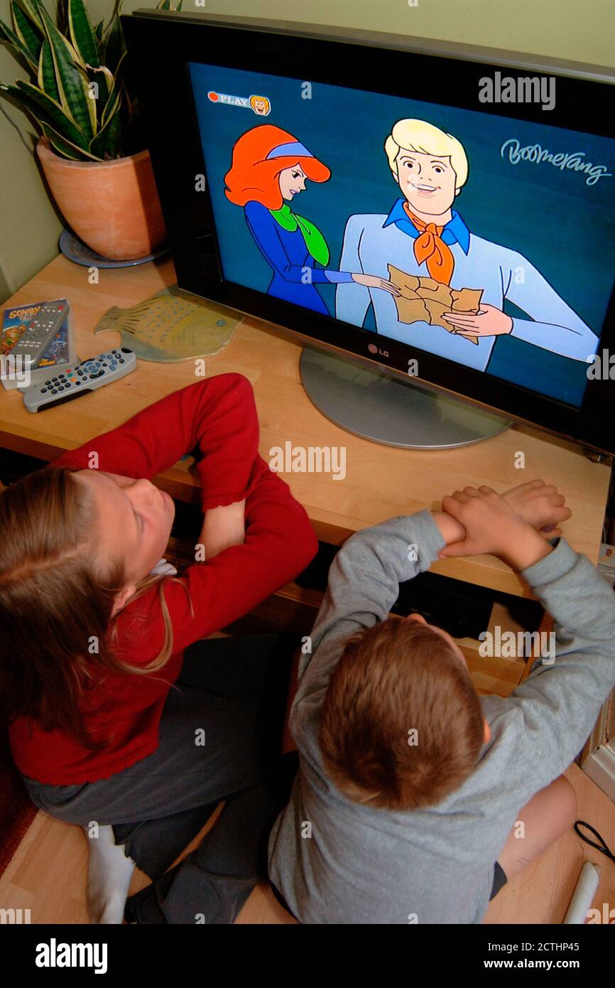 Kids watching dvd hi-res stock photography and images - Alamy