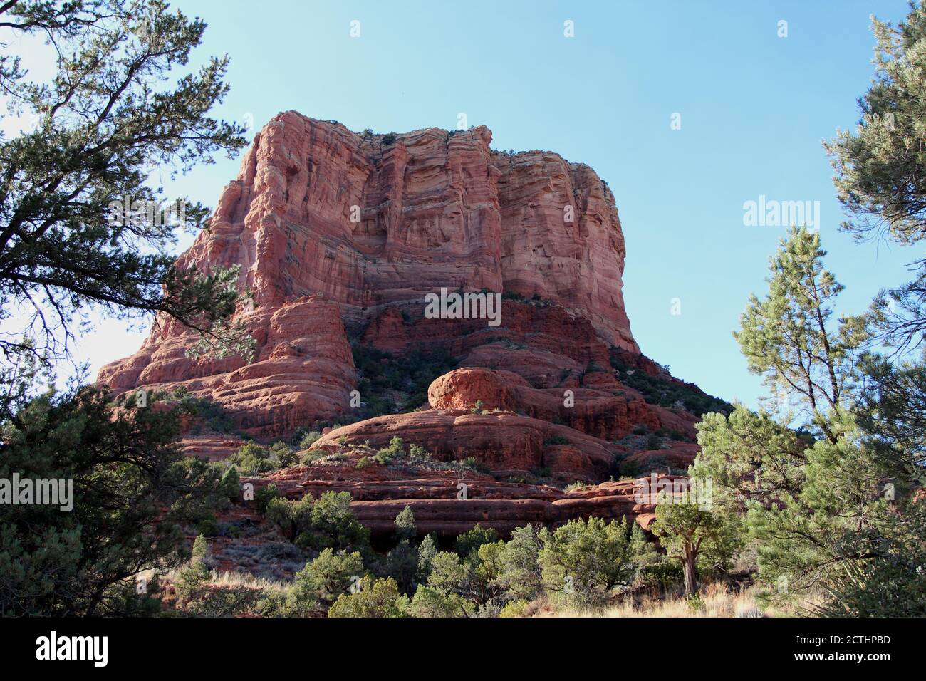 Bell Rock, a red sandstone mountain formation, in the late afternoon on ...