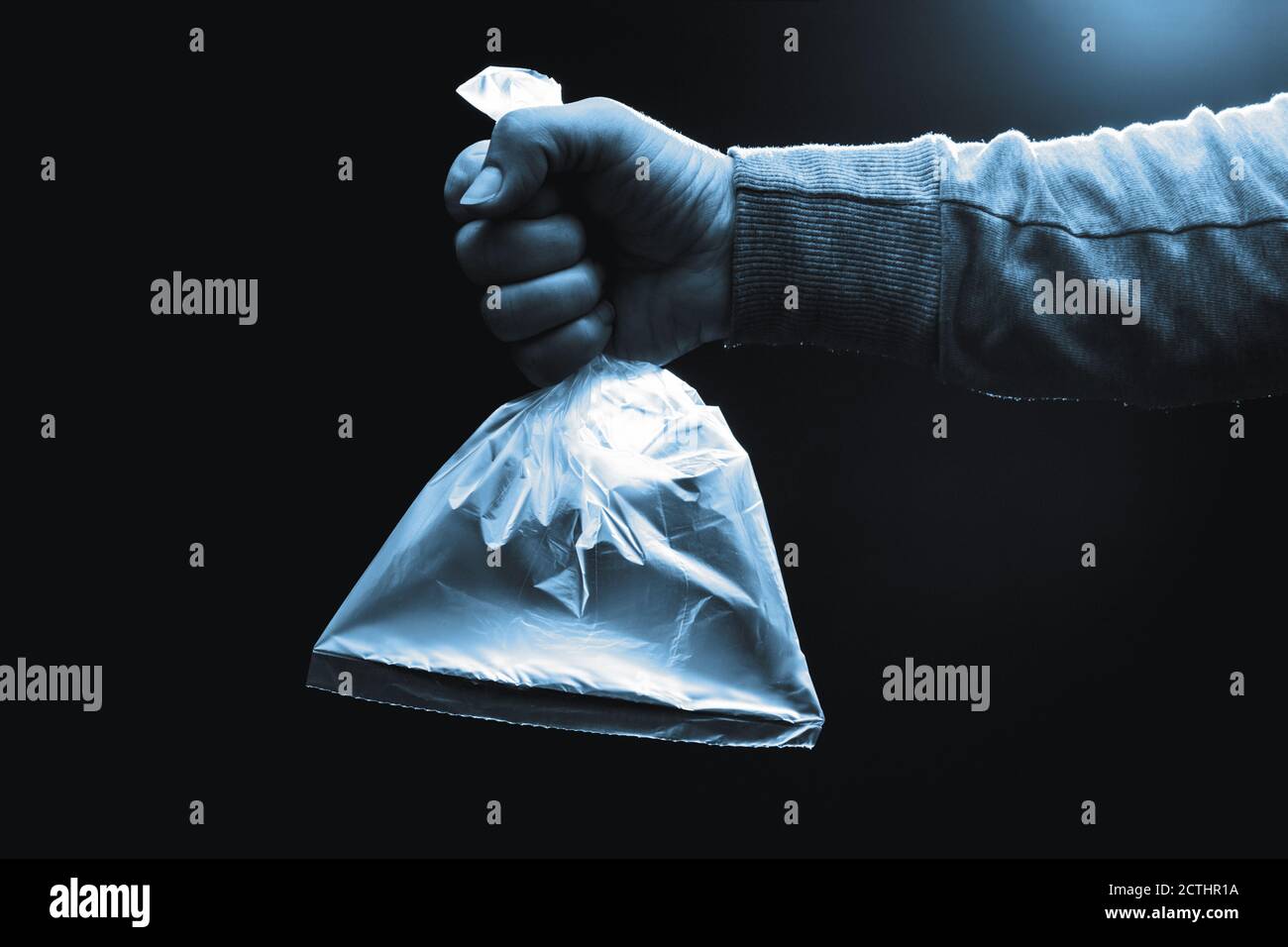 Human hand holding a plastic bag filled with clean air. Coronavirus ...