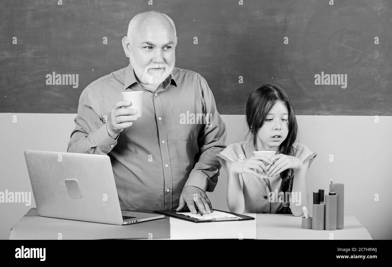 Senior teacher and girl school lesson. Relax and holiday. Modern ...