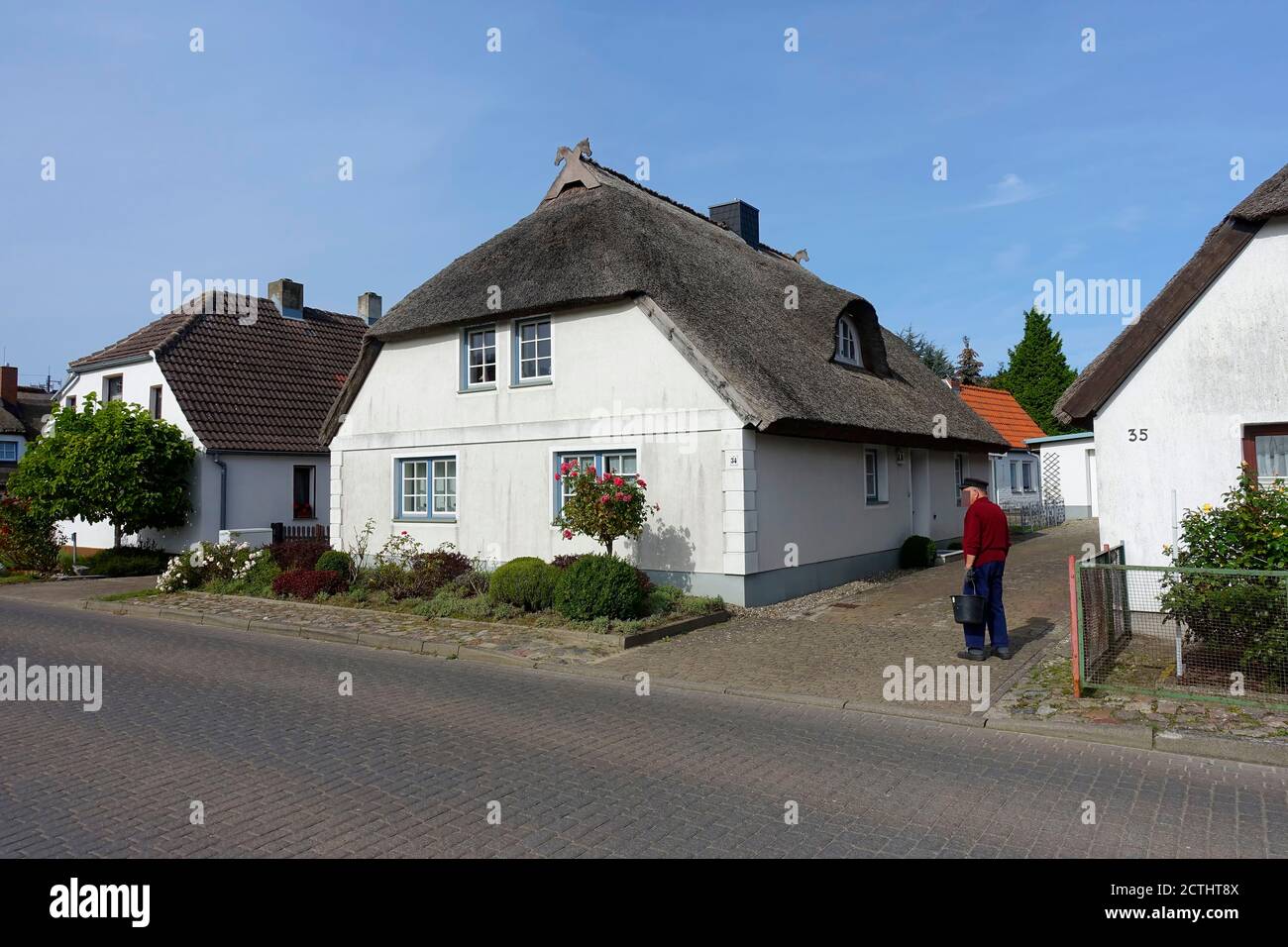 Typical thatched-roof house in Breege, Rügen, Germany Stock Photo - Alamy