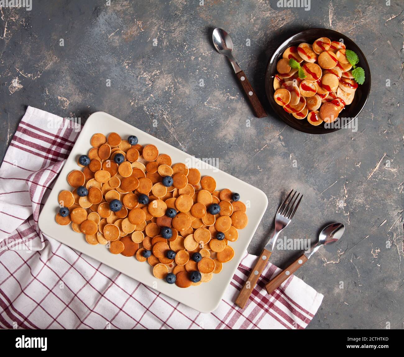 Trendy homemade breakfast, pancake cereal, mini pancakes on plates on ...