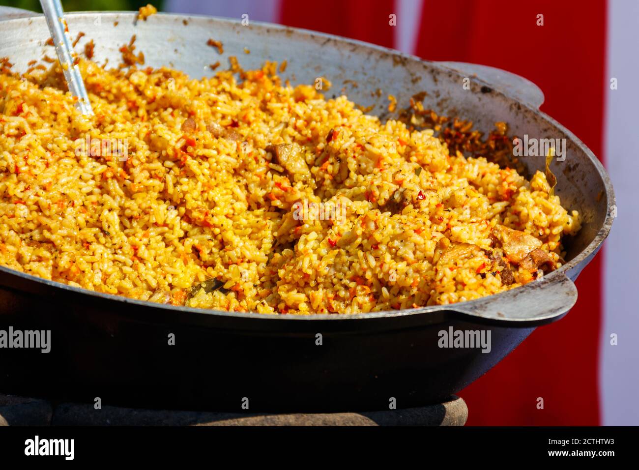 Cooking of pilaf with meat and spices Stock Photo - Alamy