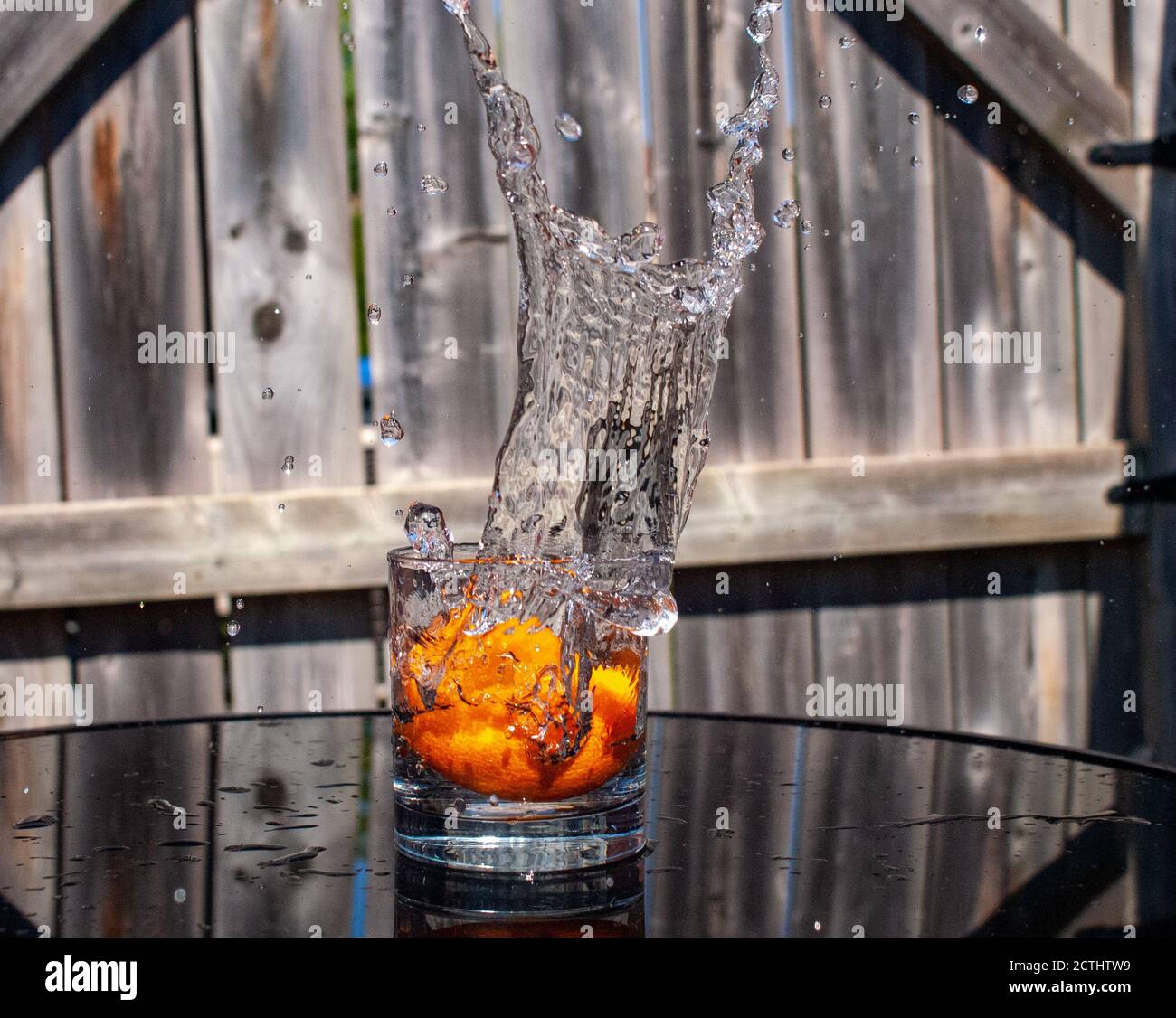 Orange water splash hi-res stock photography and images - Alamy
