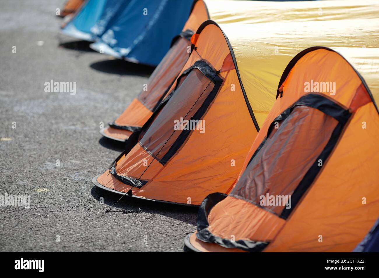 Tents on the pavement during a protest Stock Photo - Alamy