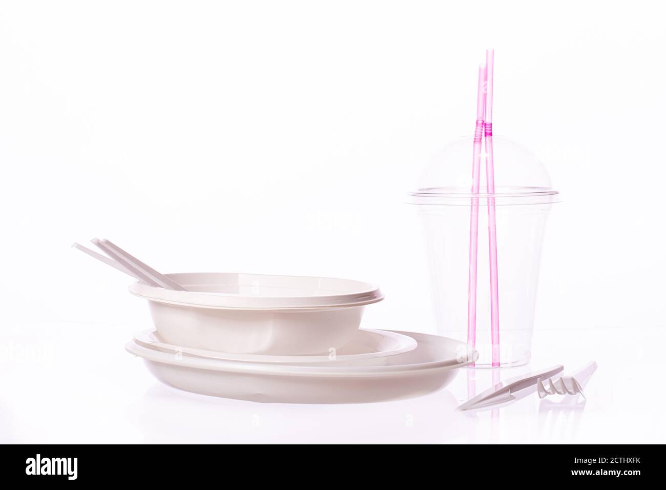 Disposable plastic dinnerware isolated on white background. Plastic ...