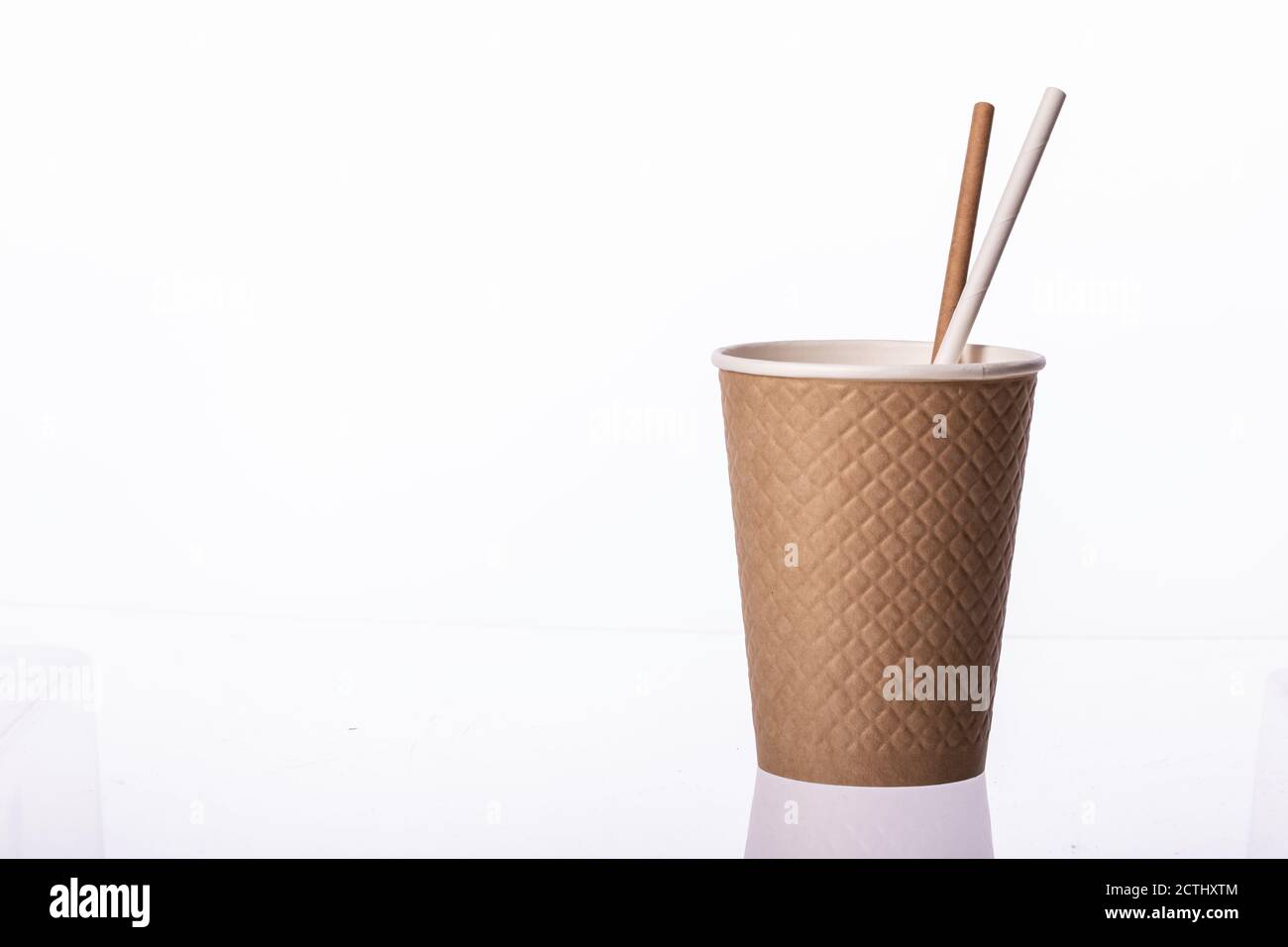 Disposable brown paper cup waffle texture with straws, isolated white ...