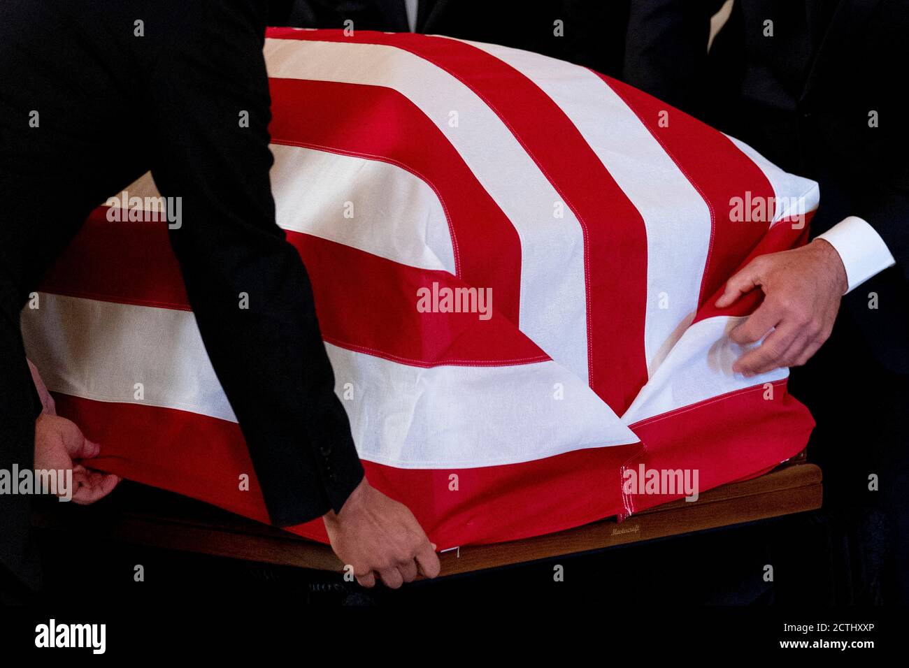 American flag draped over casket hi-res stock photography and images ...