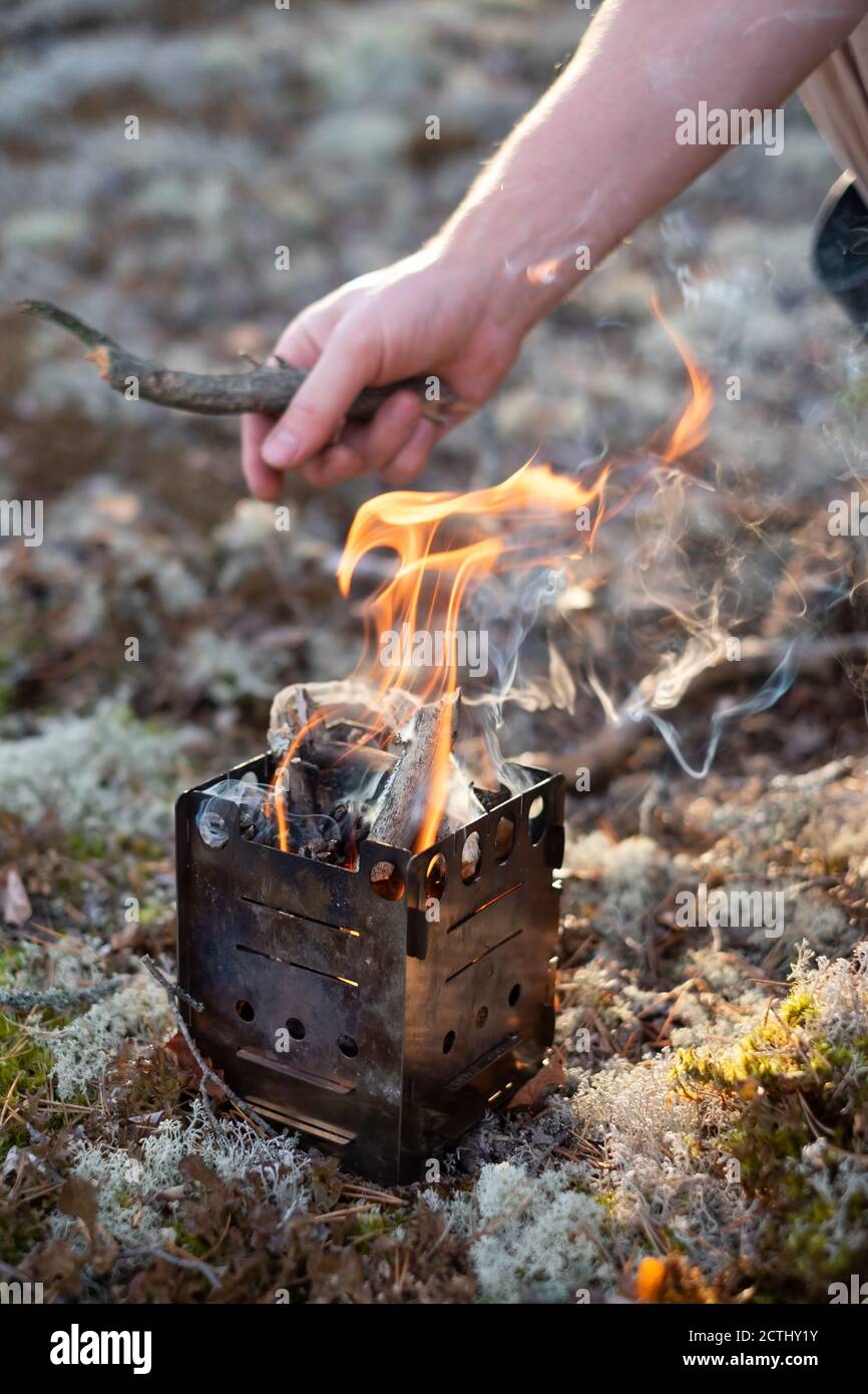 Fire in forest camp. Special small splinter tourist campfire Stock ...