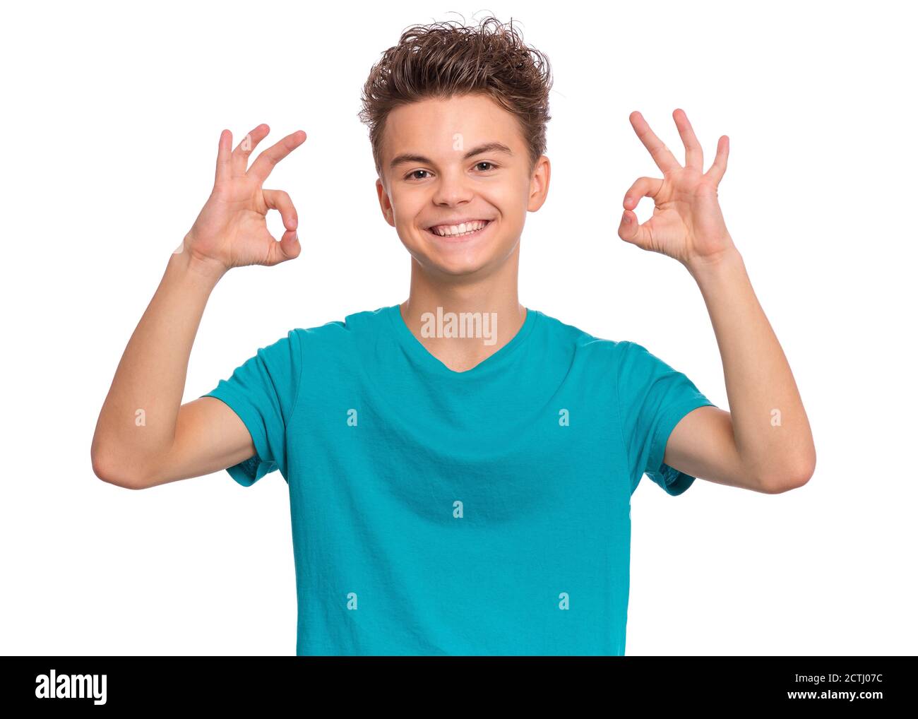 Portrait of handsome teen boy making Ok Gesture. Happy cute child ...