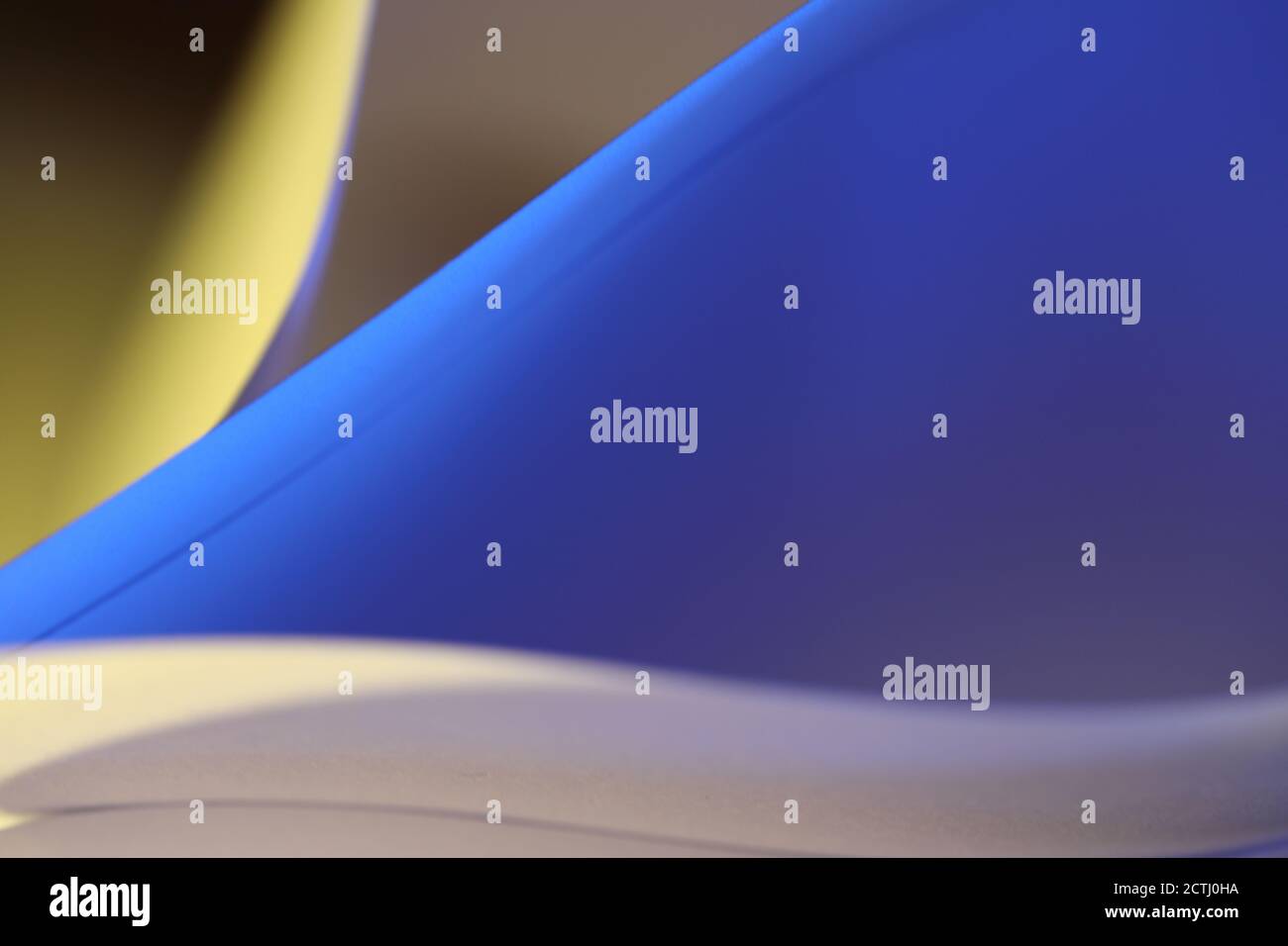 The abstract picture of curved paper in vivid colours Stock Photo - Alamy