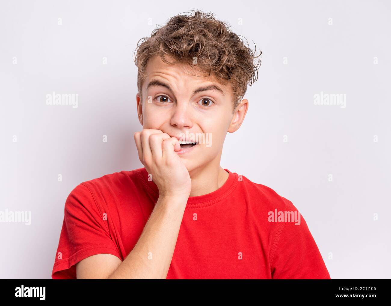Surprised teen boy hi-res stock photography and images - Alamy
