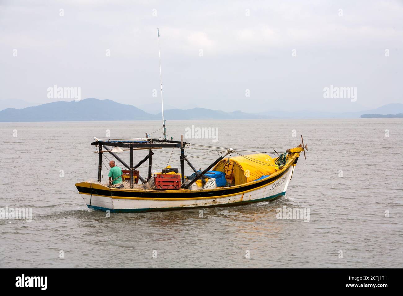 Fishing boat in ocean in Brazil Stock Photo - Alamy