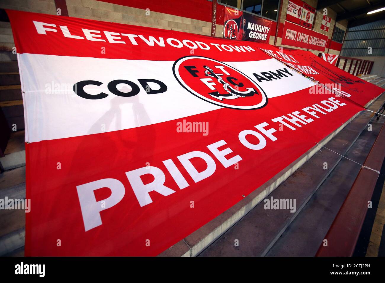Fleetwood Town, Cod Army, Pride of Fylde flags in the stands during the ...