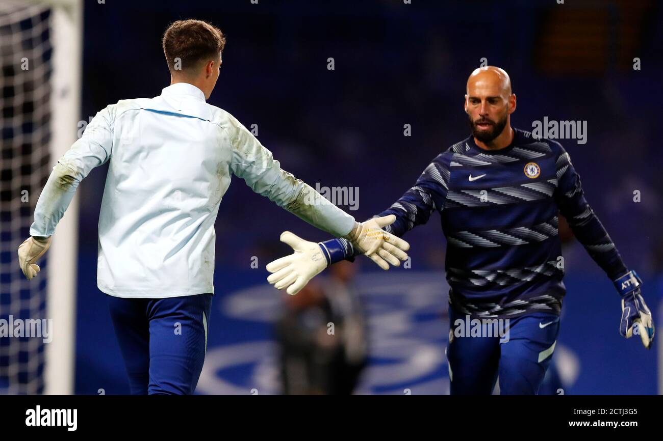 Chelsea goalkeeper Kepa Arrizabalaga (left) and Willy Caballero warming ...