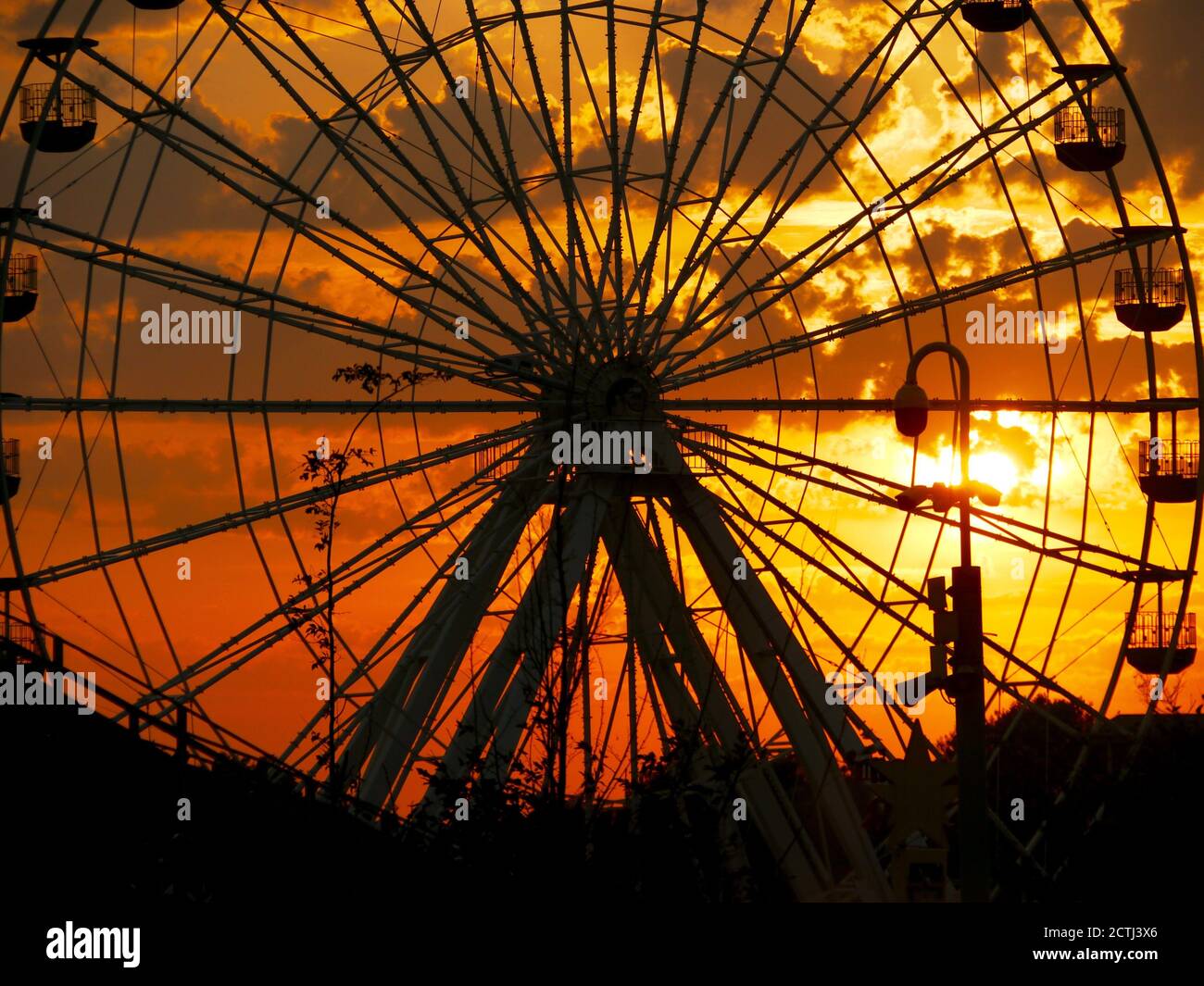 Big wheel at sunset hi-res stock photography and images - Alamy
