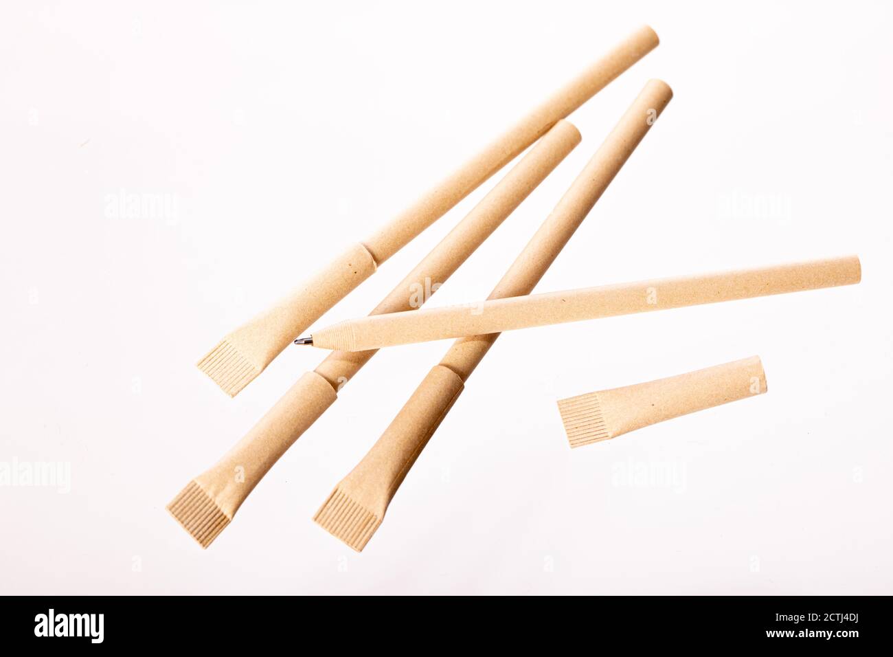 Reusable eco-friendly craft paper pens isolated on white background ...