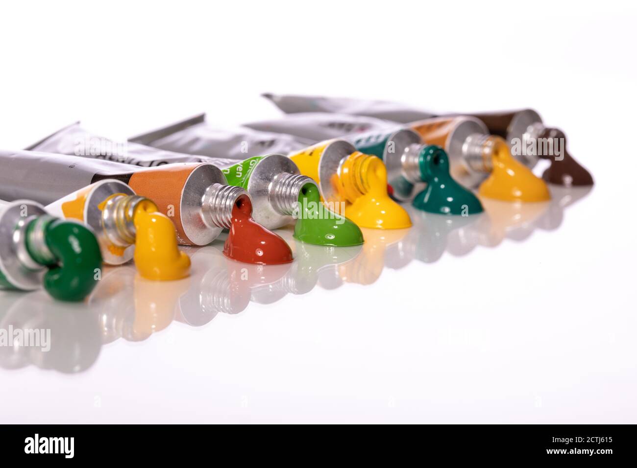 Colorful paint tubes squeezed on white sheet of glass Stock Photo - Alamy