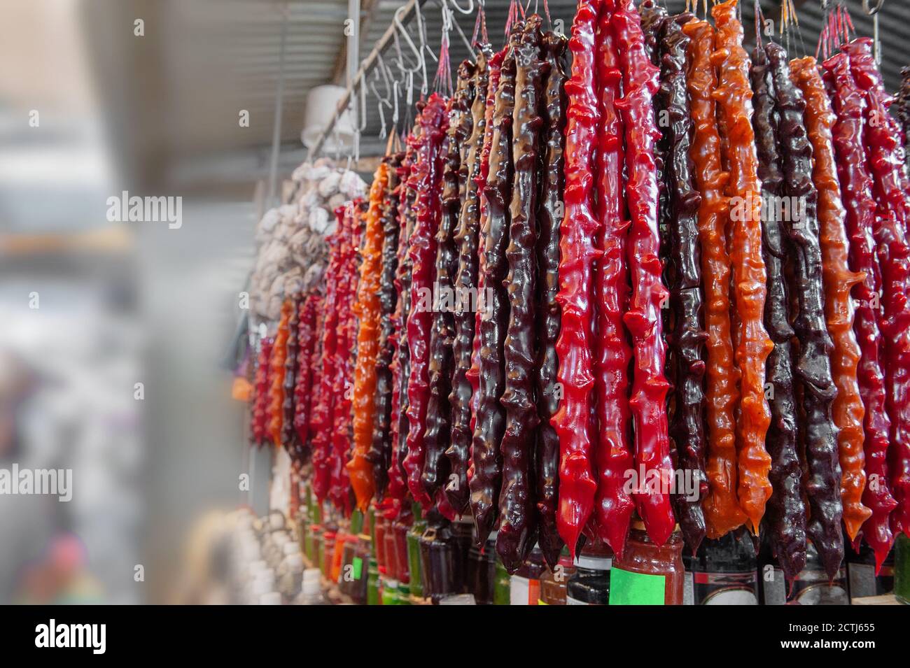 Churchkhela. Traditional Georgian sweets in the form of sausage with ...