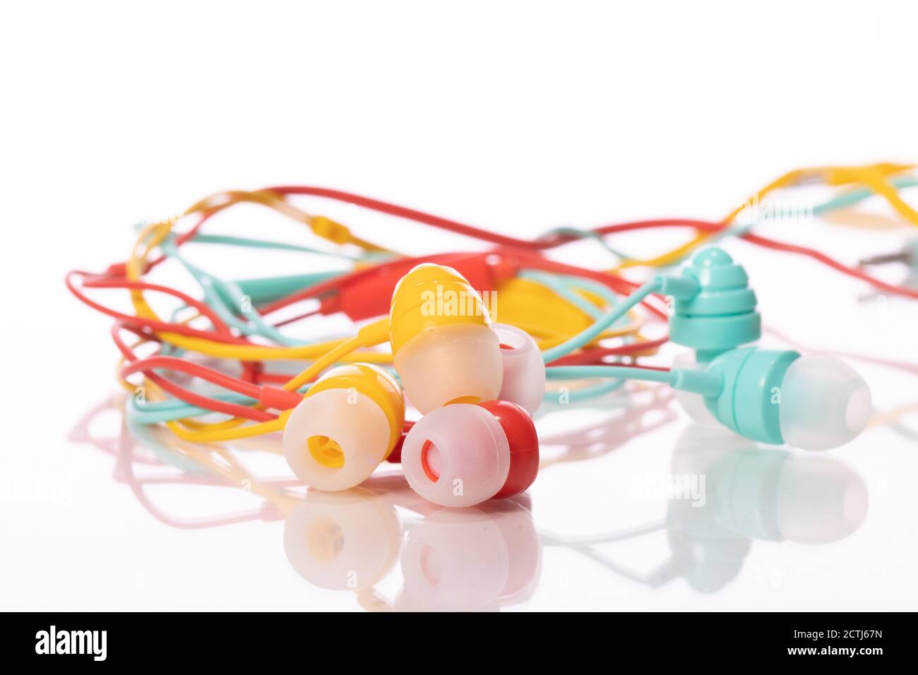 Tangled earphones hi-res stock photography and images - Alamy