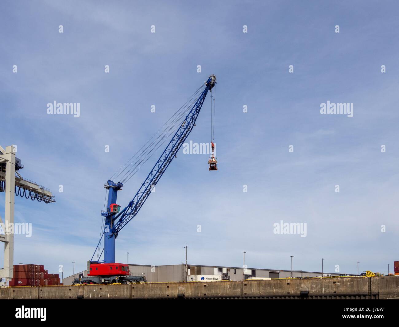 a crane for loading and unloading container ships is in the port Stock ...