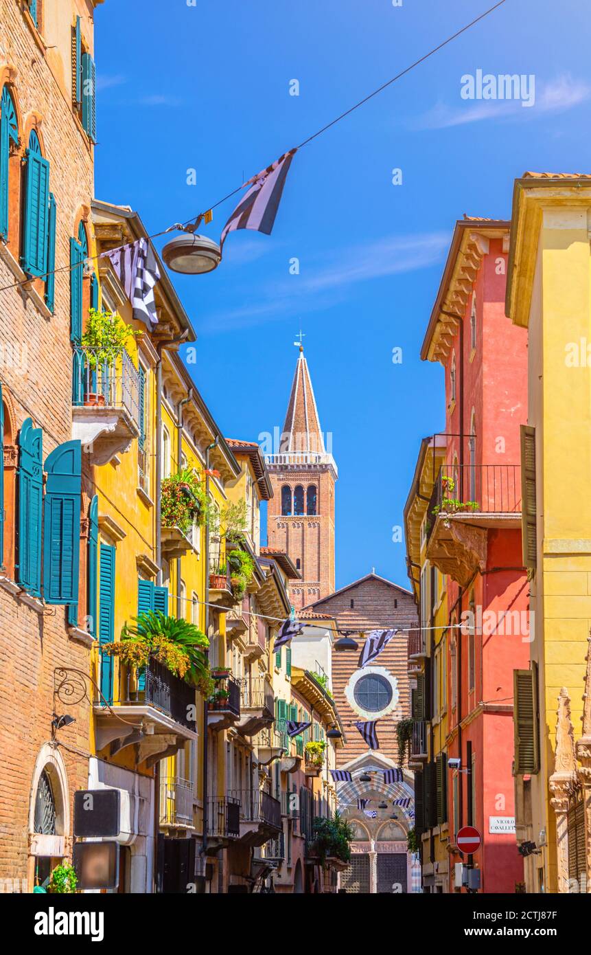 Typical italian street with traditional colorful buildings, shutter ...