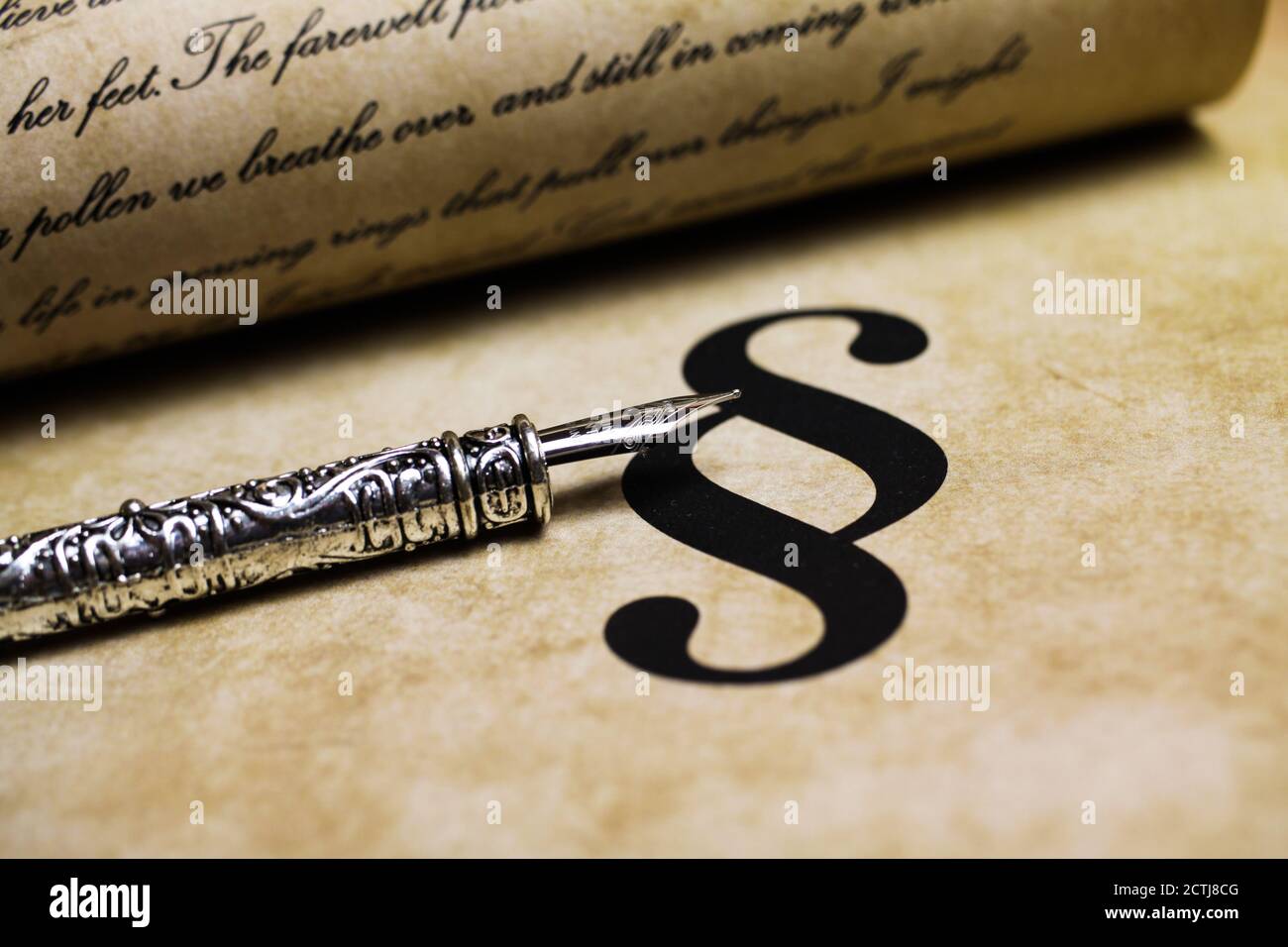 Closeup of isolated paragraph sign on ol vintage paper with silver ...