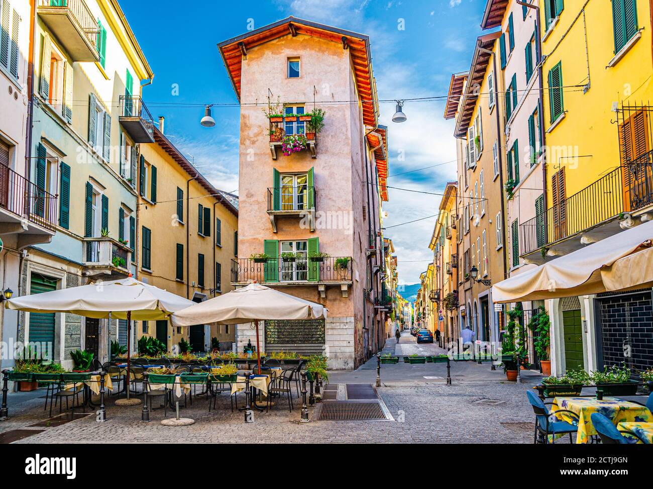 Traditional colorful building with balconies and shutter windows in ...