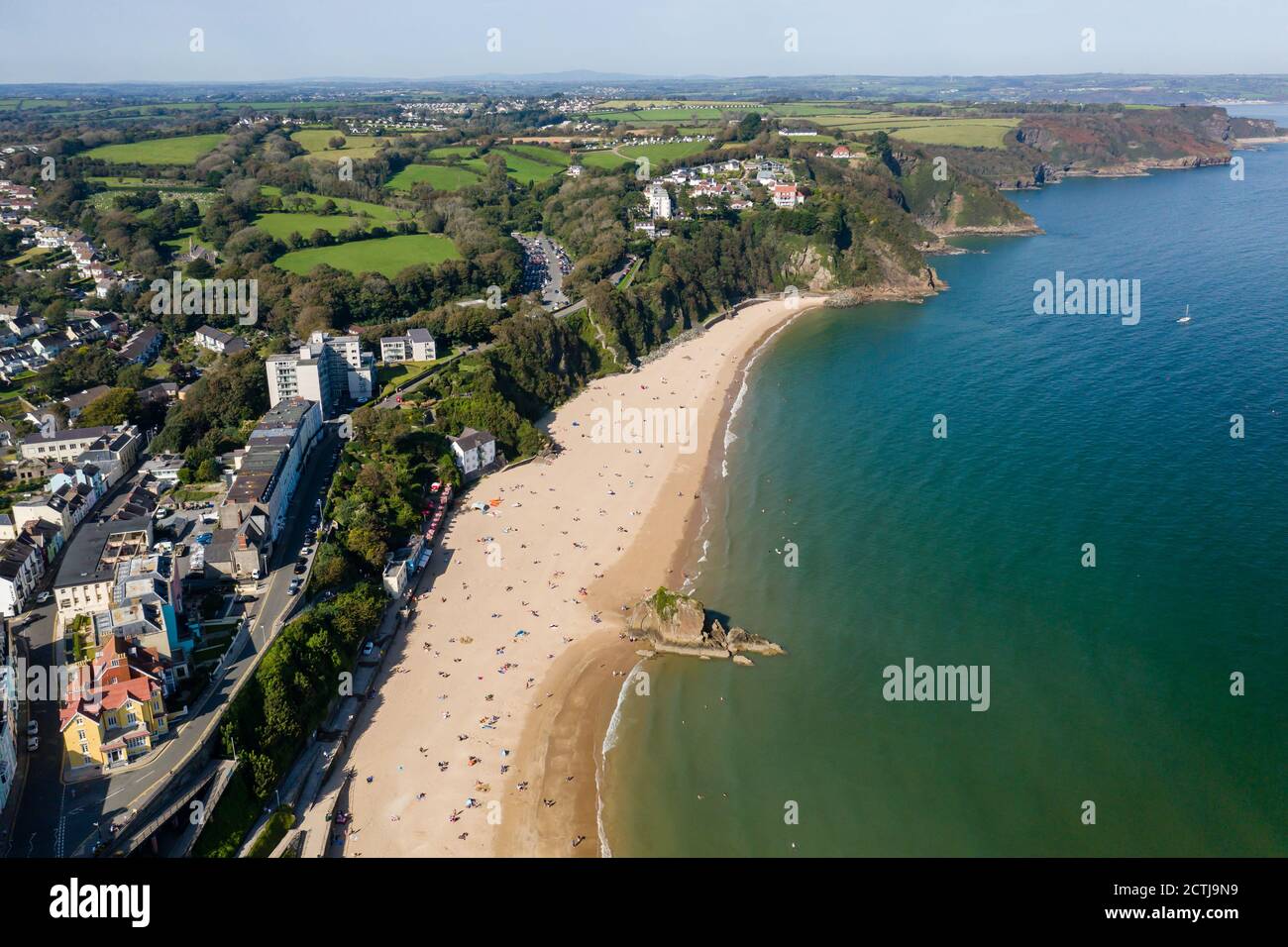 Aerial drone view of the idyllic Welsh seaside town of Tenby in ...