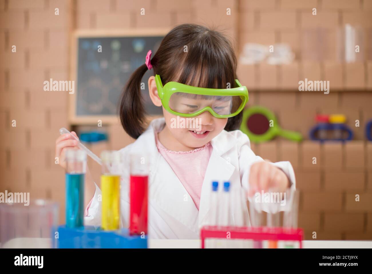 young girl play science experiments for homeschooling Stock Photo - Alamy
