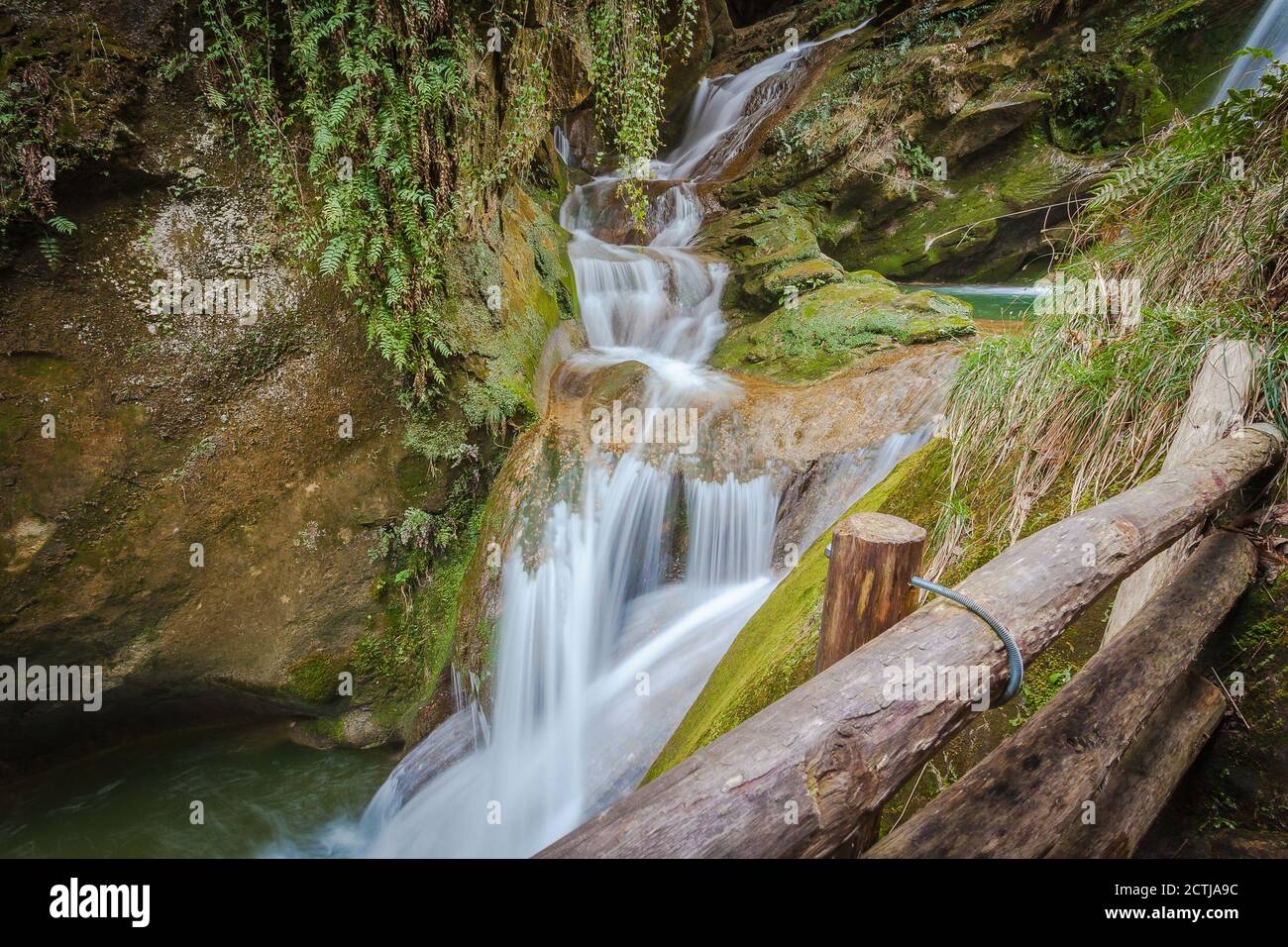 Small waterfalls in caves carved out of sandstone Stock Photo - Alamy