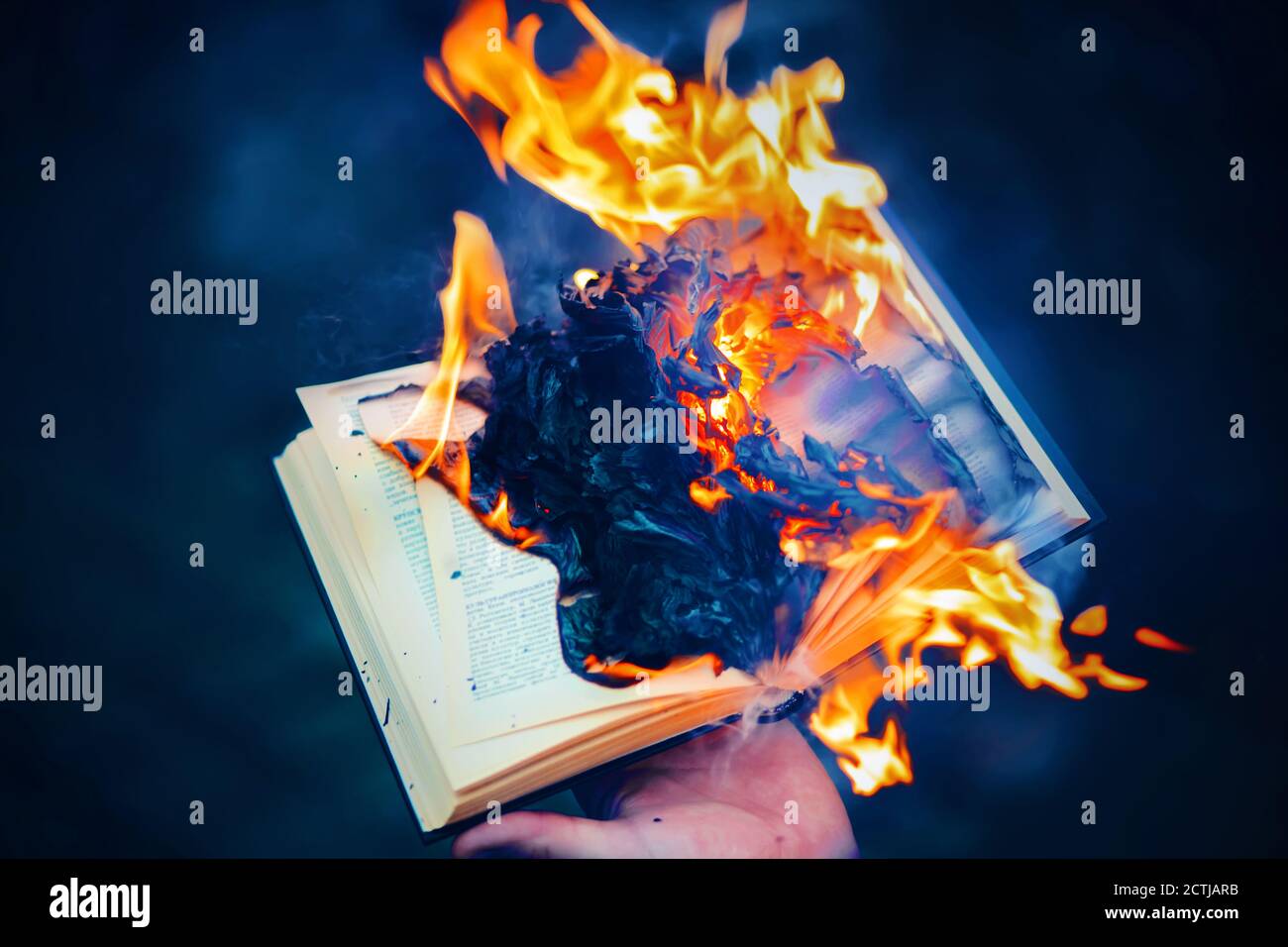 Burning book cover hi-res stock photography and images - Alamy