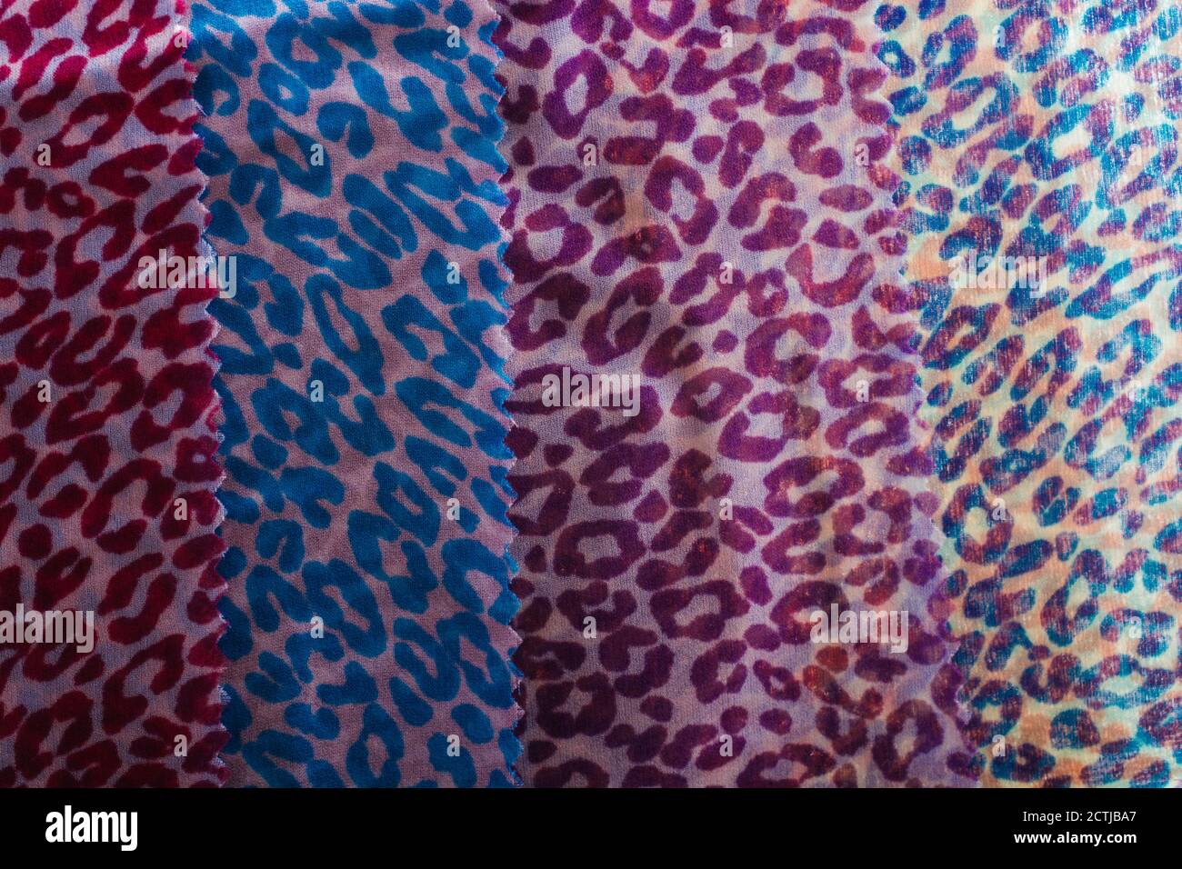Colorful leopard print fabric texture Stock Photo - Alamy