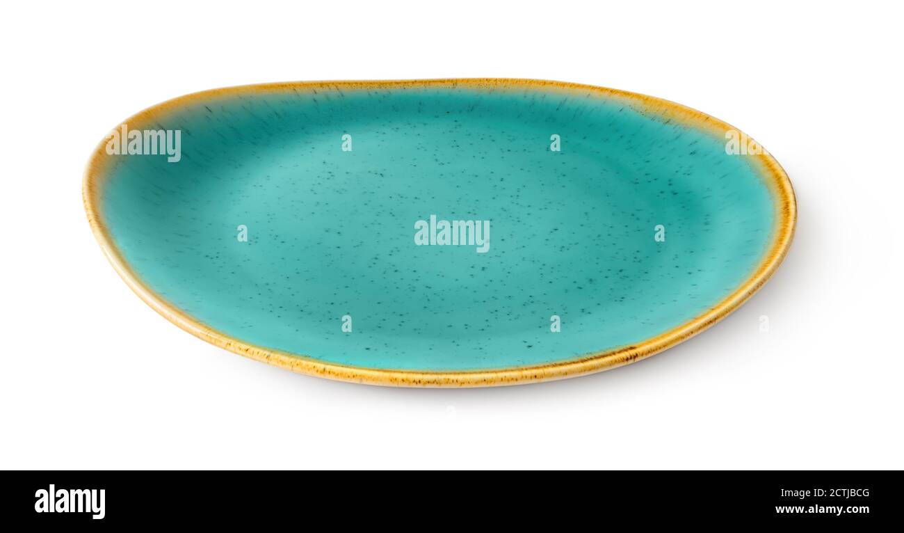 Side view of oval turquoise ceramic plate with yellow border isolated ...