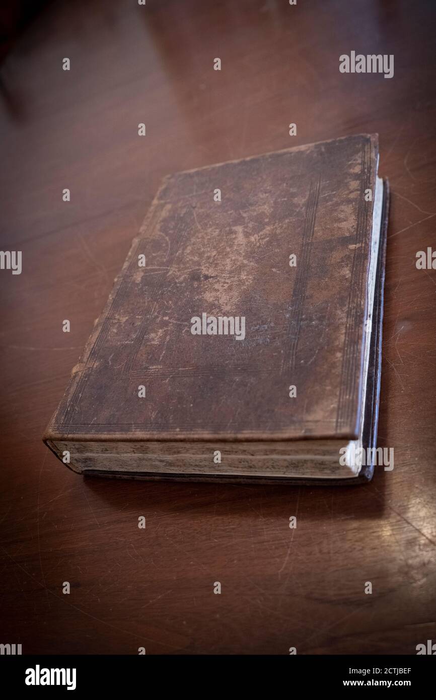 Old book from 18th. century on the table Stock Photo - Alamy