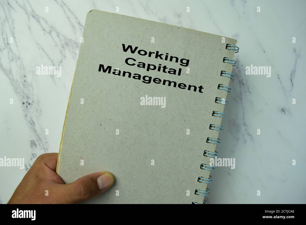 Working Capital Management write on a book isolated on office desk ...