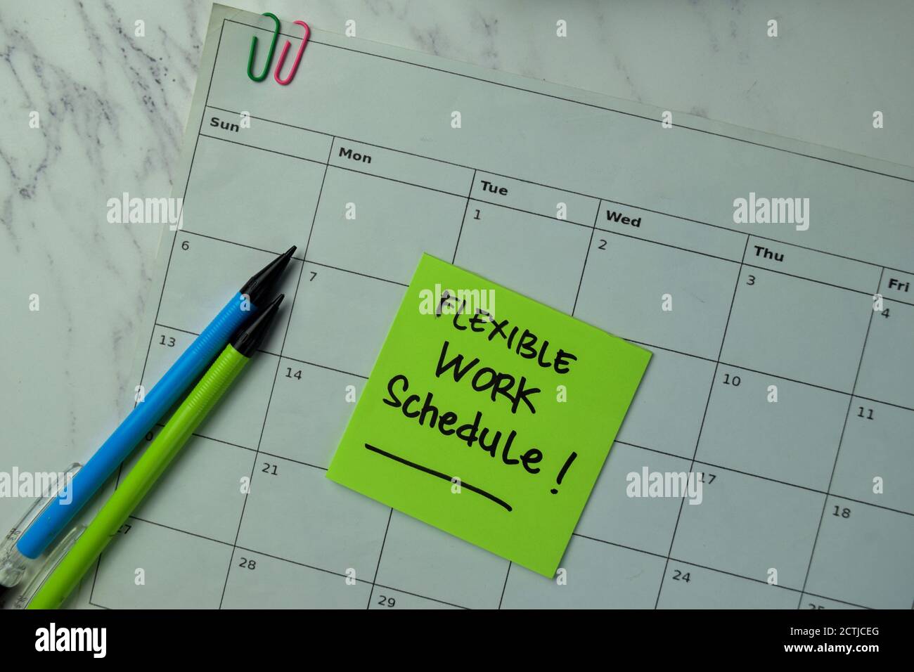 Flexible Work Schedule write on sticky notes isolated on office desk ...