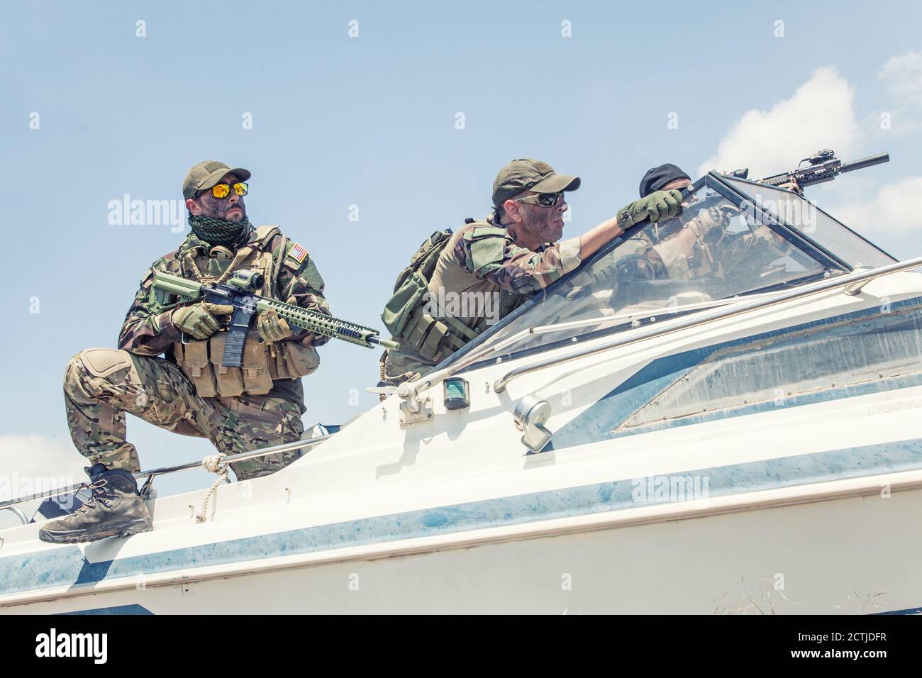 Anti terrorist squad fighters, SEALs team soldiers armed service rifle ...